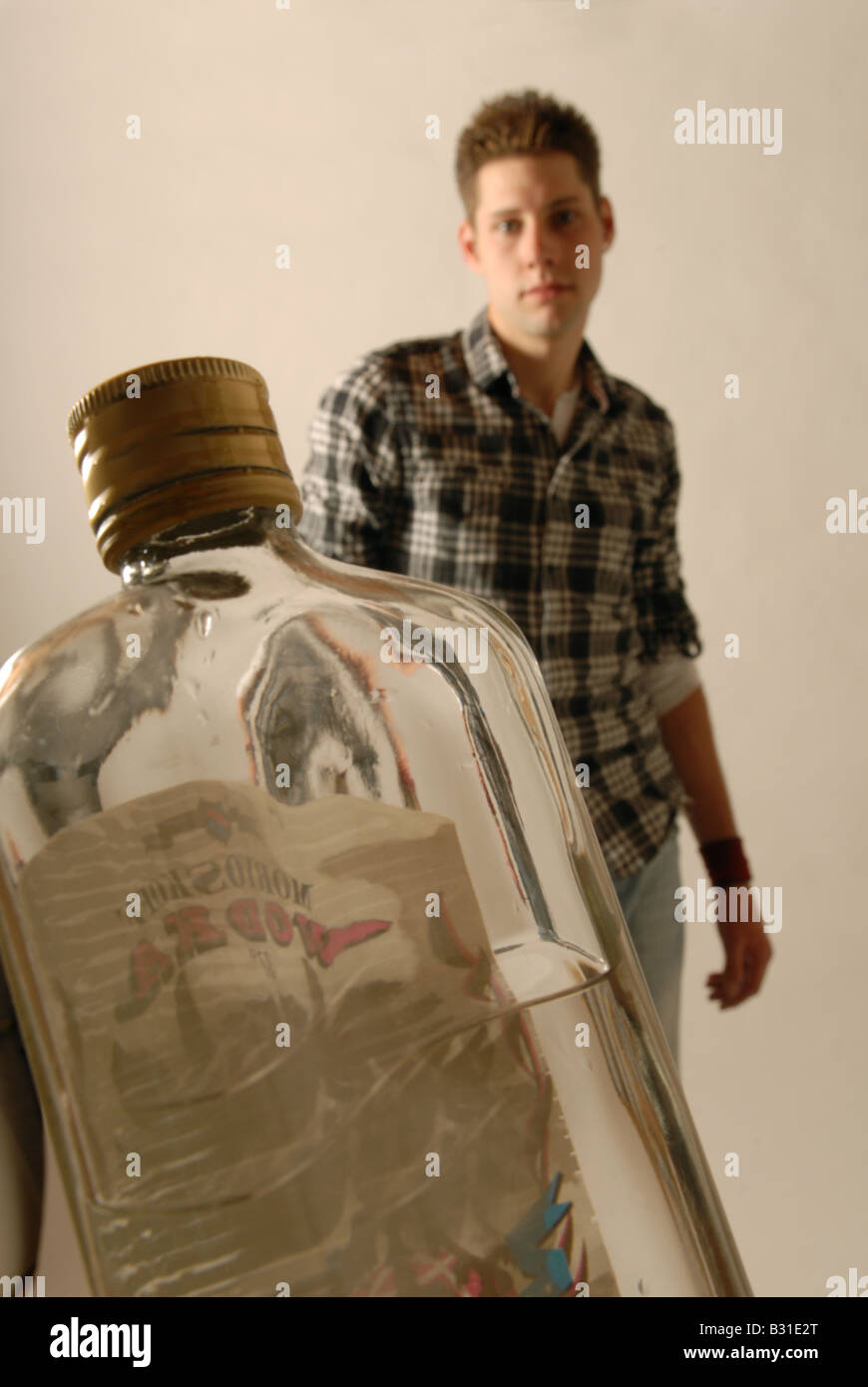 A young man with a drinking problem Stock Photo - Alamy