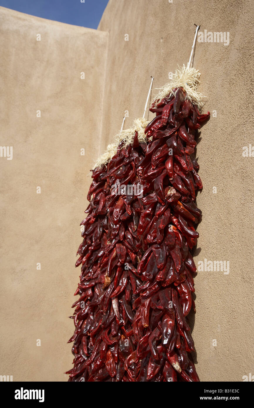 chillis drying in sun Stock Photo - Alamy