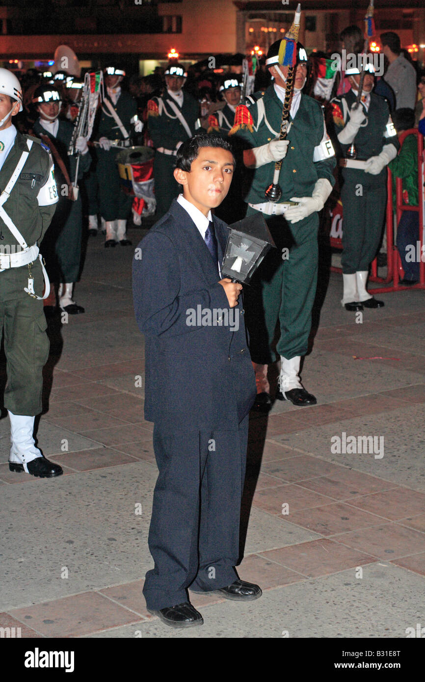 A boy during a catholic procession, Tunja, Boyacá, Colombia, South ...