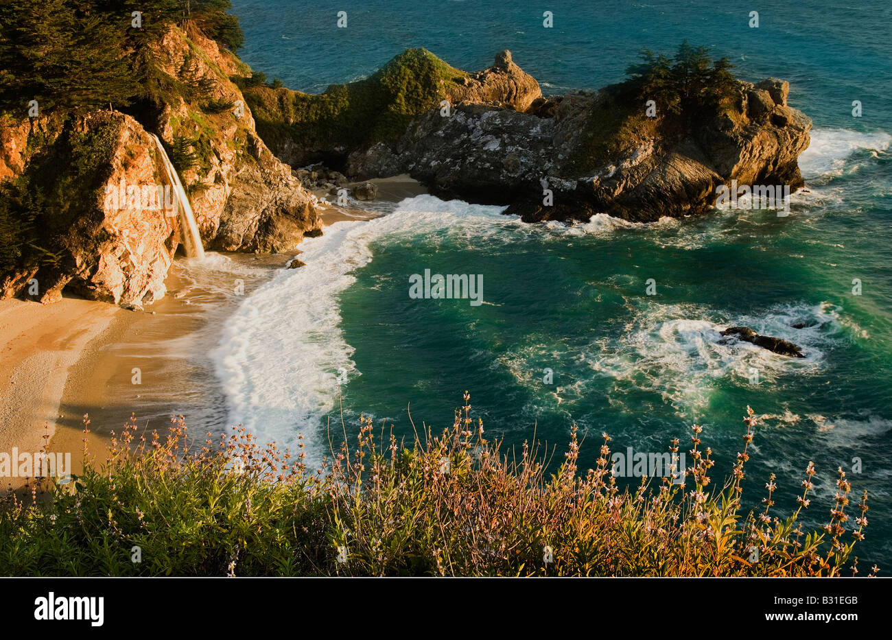 McWay Falls spills onto Julia Pfeiffer beach along the Big Sur coast ...