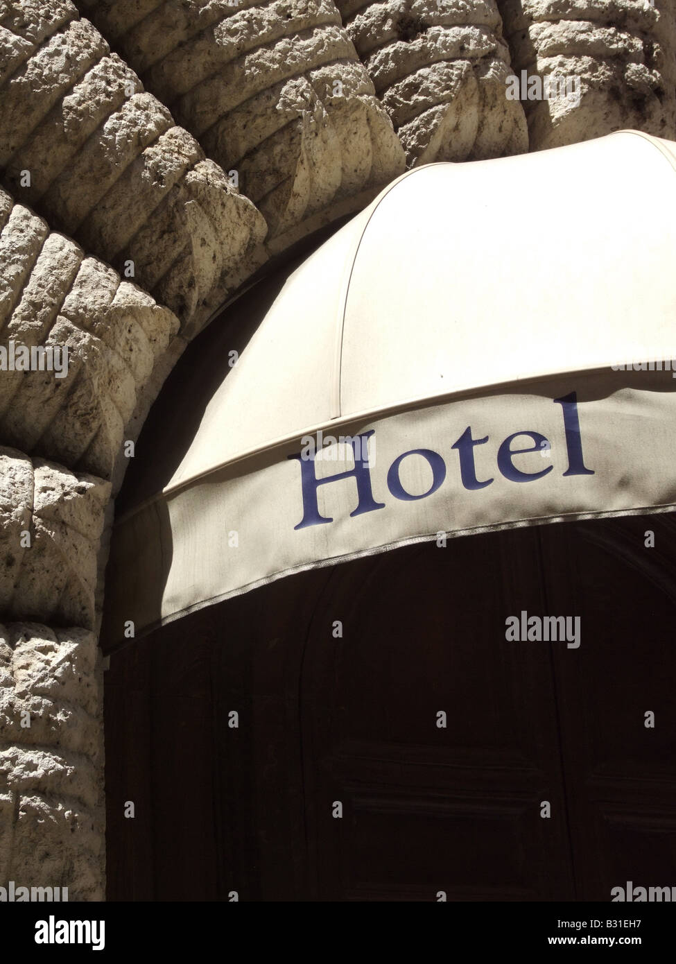 hotel sign notice on building in italy in sun Stock Photo - Alamy