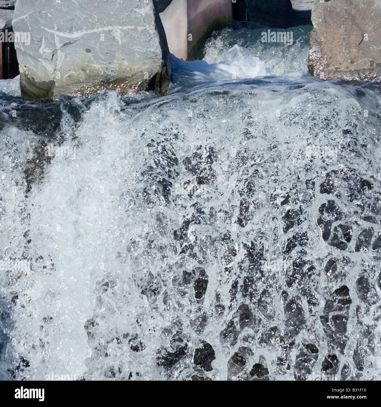 artificial waterfall with splashing water Stock Photo - Alamy
