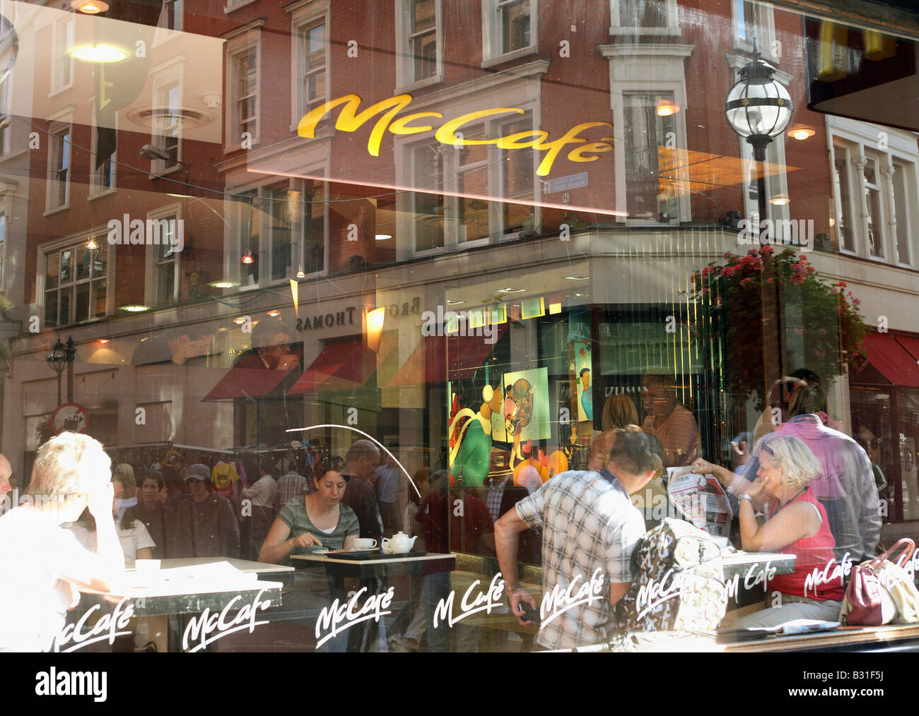 People sitting in a McCafe, Dublin, Ireland Stock Photo - Alamy