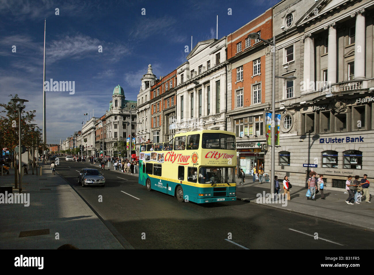 A sightseeing bus in the O Connell Street, Dublin, Ireland Stock Photo ...