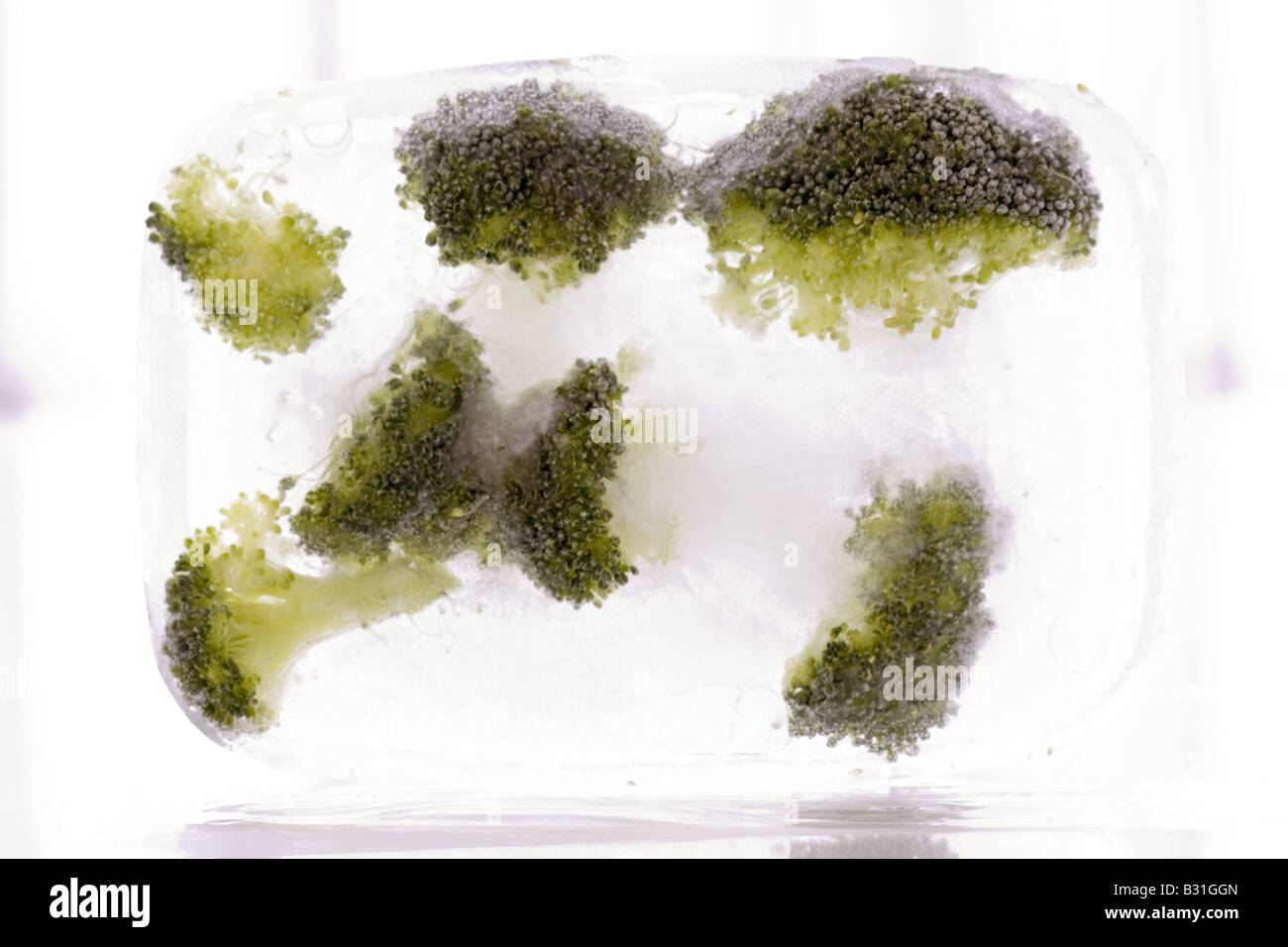 Broccoli frozen in ice Stock Photo - Alamy