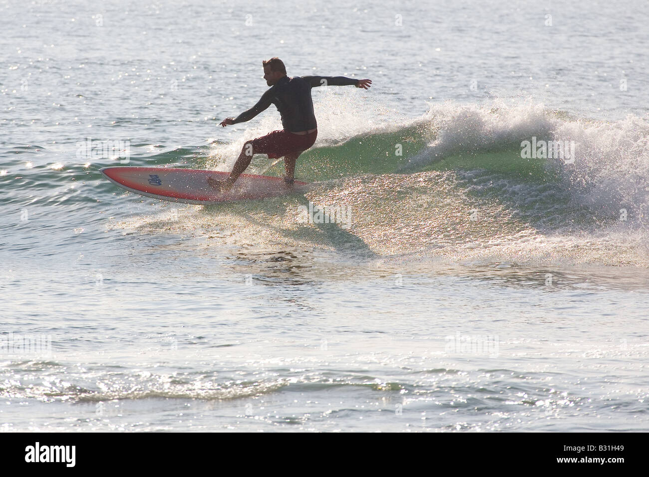 Boy surfing wave hi-res stock photography and images - Alamy
