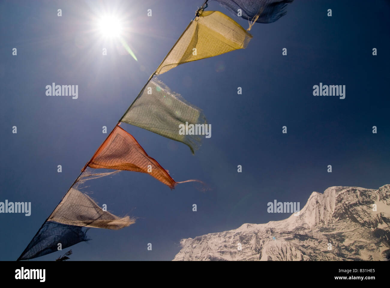 Prayer flags in the Annapurna mountains, Himalayas. Nepal Stock Photo - Alamy