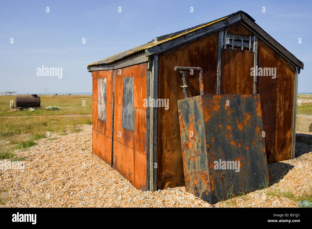 A rusting rusty shed and hut on the shingle at Dungeness part of Romney ...