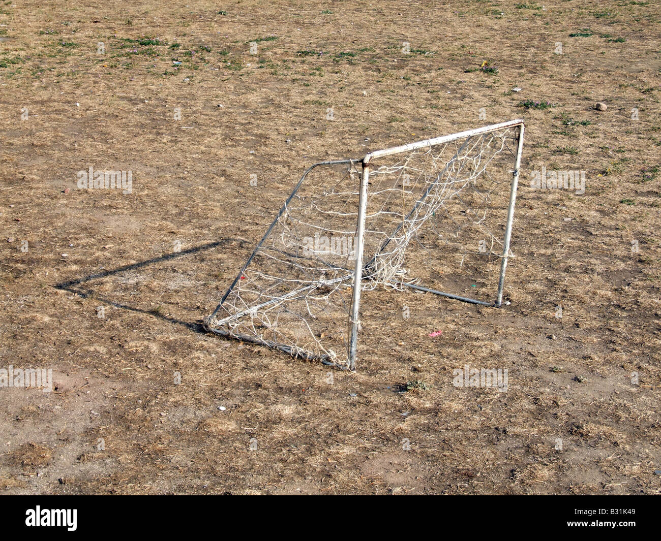 detail of old football goal posts in dirt field Stock Photo - Alamy