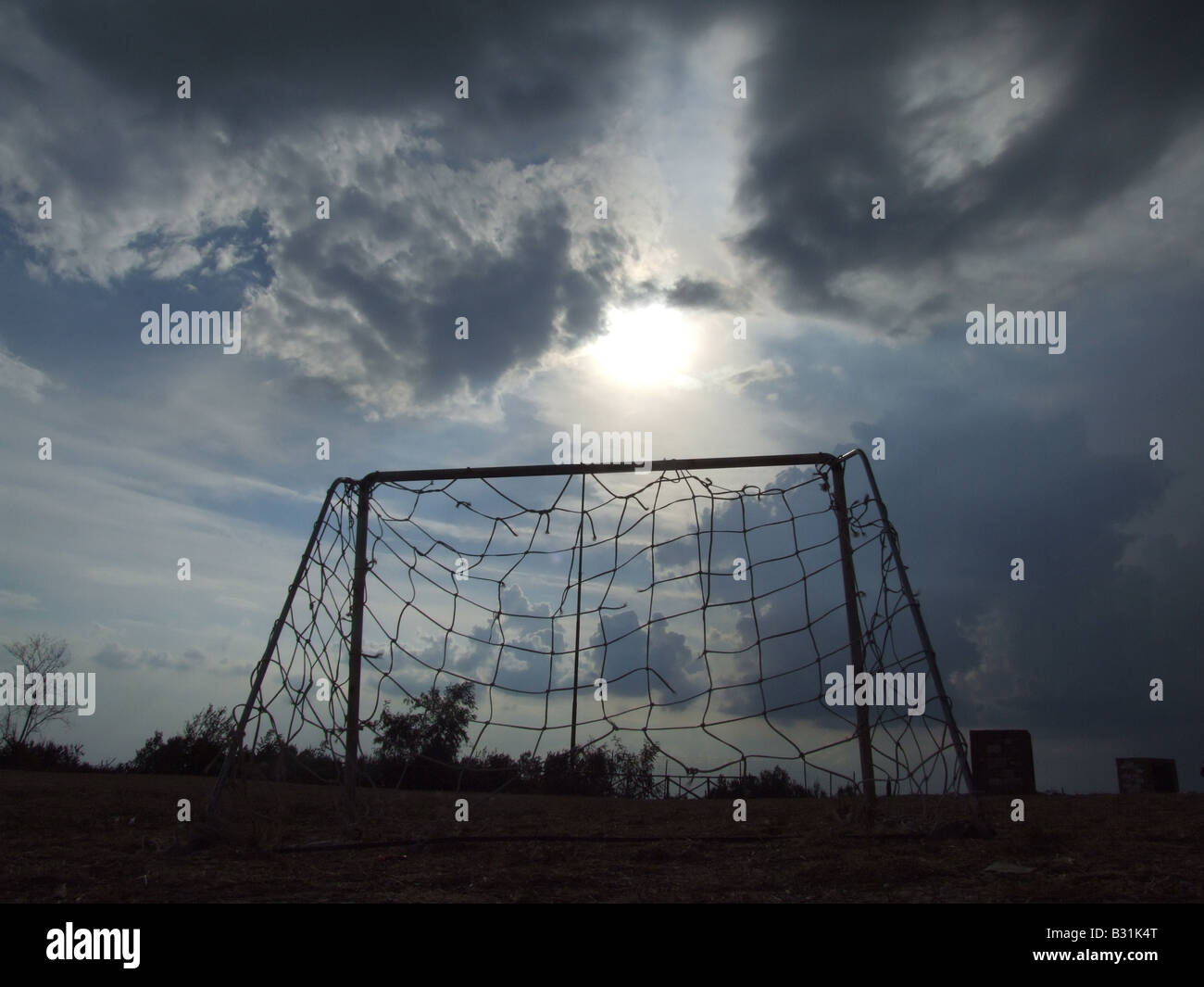 silhouette detail old football goal posts in field Stock Photo - Alamy