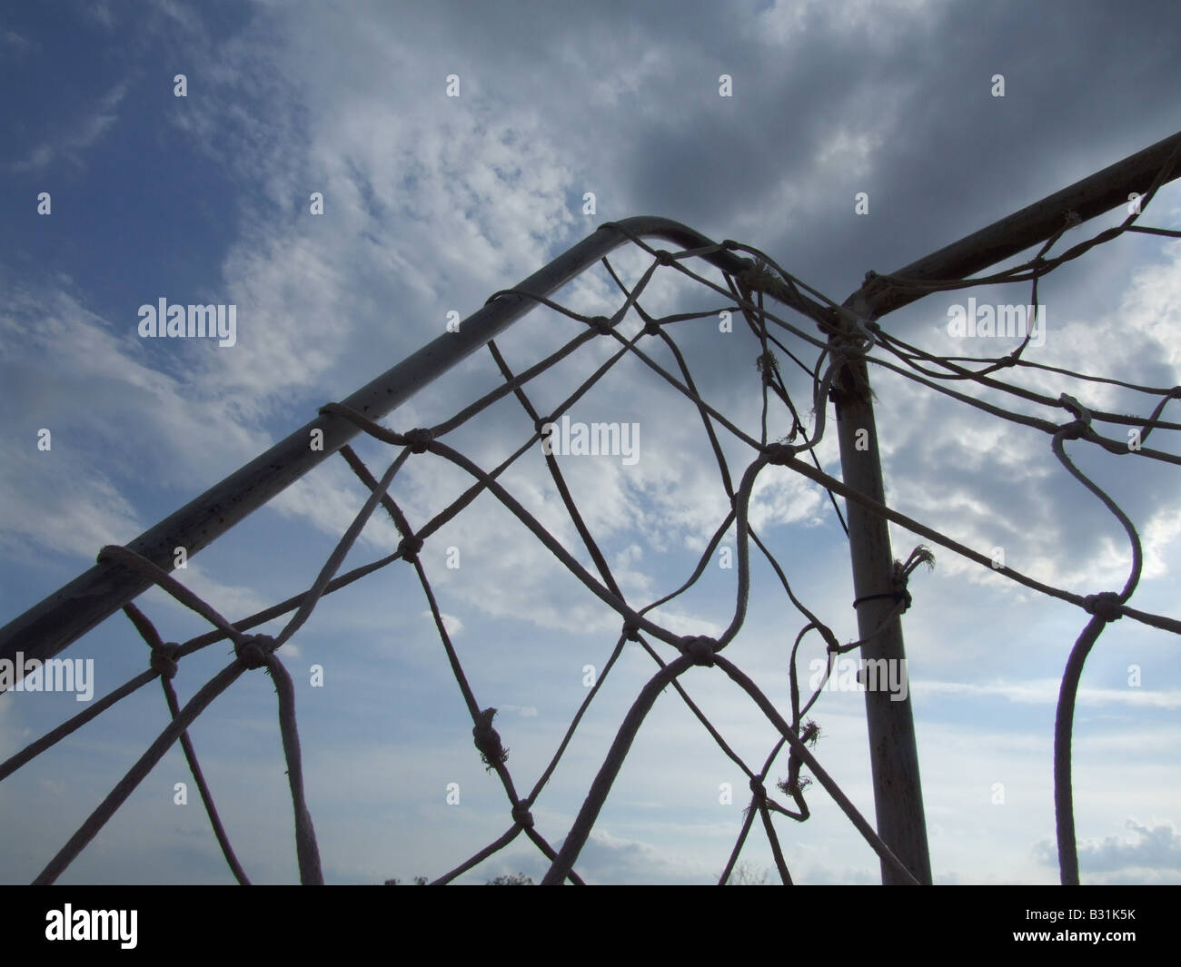 silhouette detail old football goal posts in field Stock Photo - Alamy