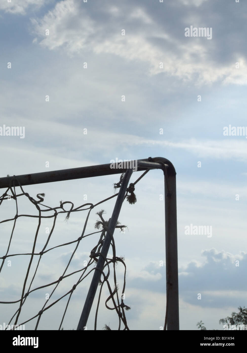 silhouette detail old football goal posts in field Stock Photo - Alamy