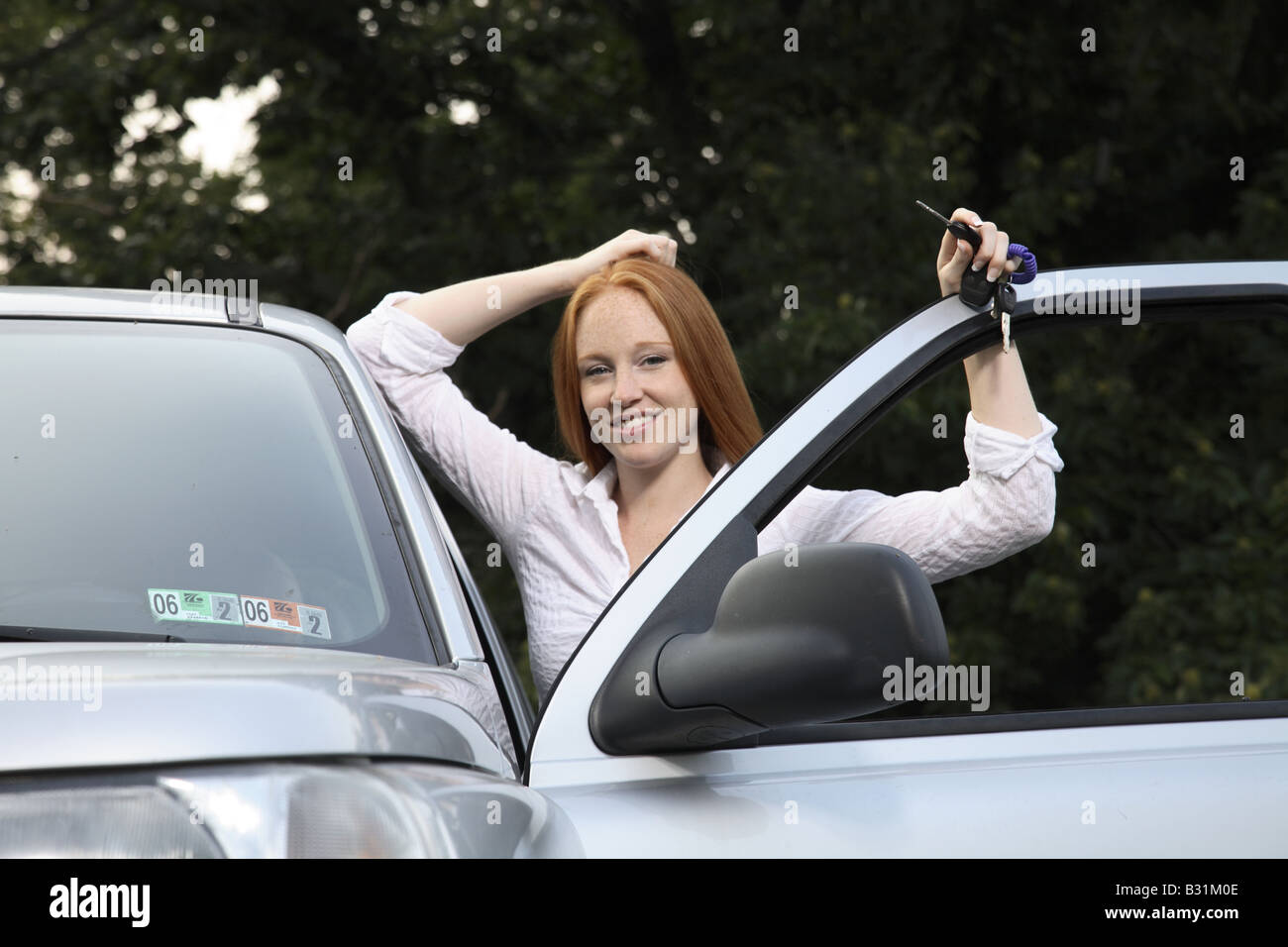 woman by car Stock Photo - Alamy