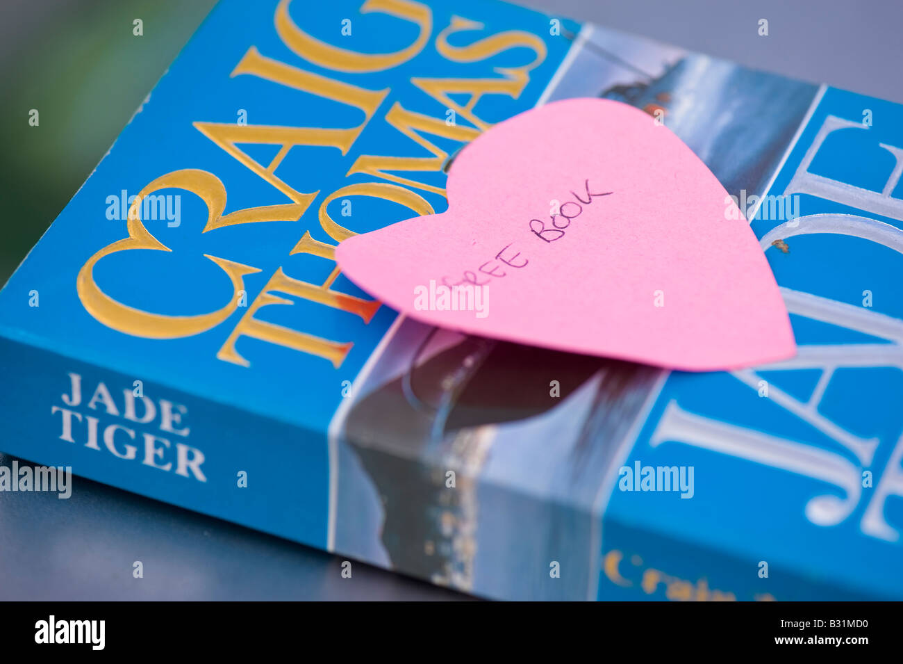 book with pink hart Stock Photo - Alamy