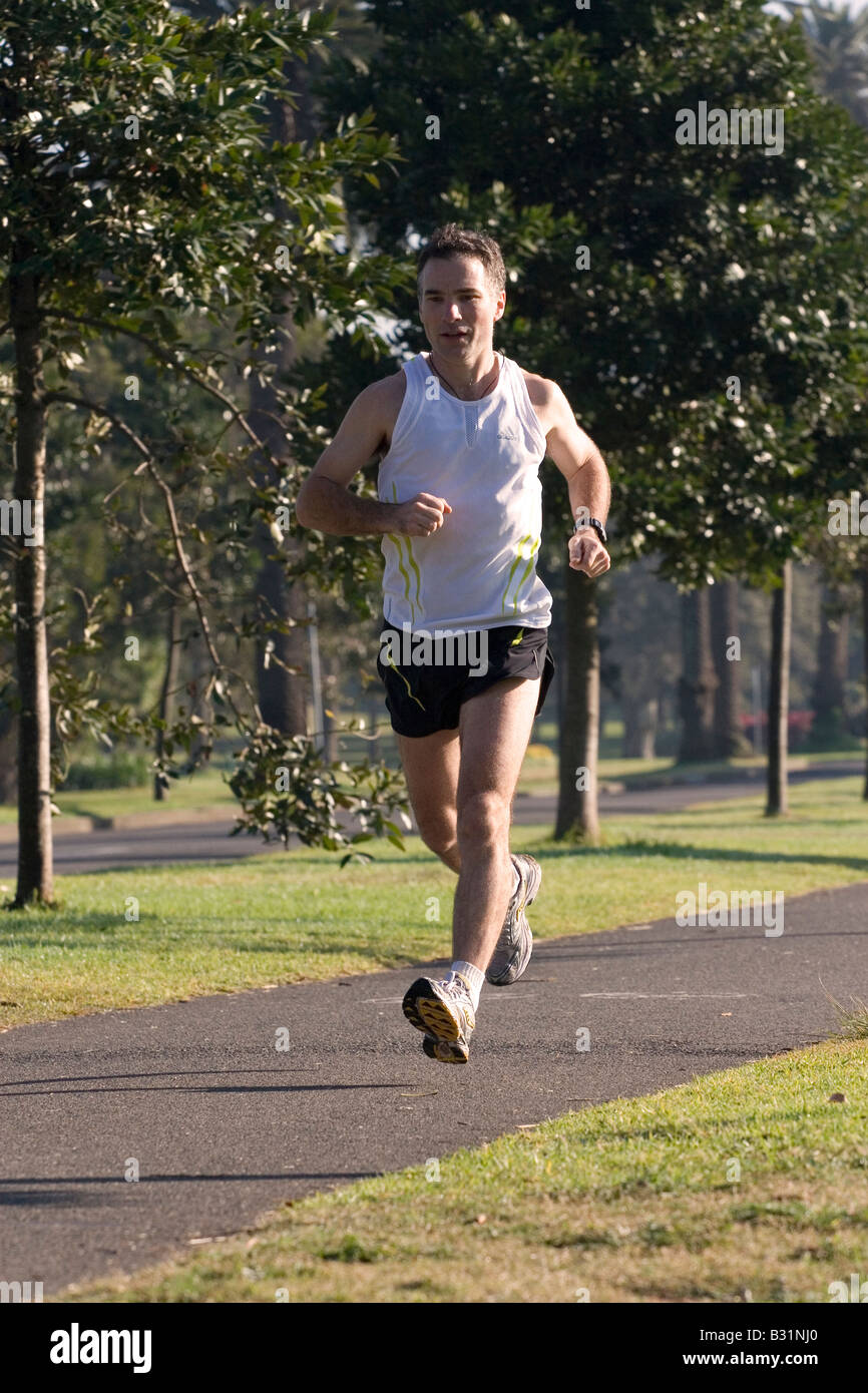Male Runner in Park Stock Photo - Alamy