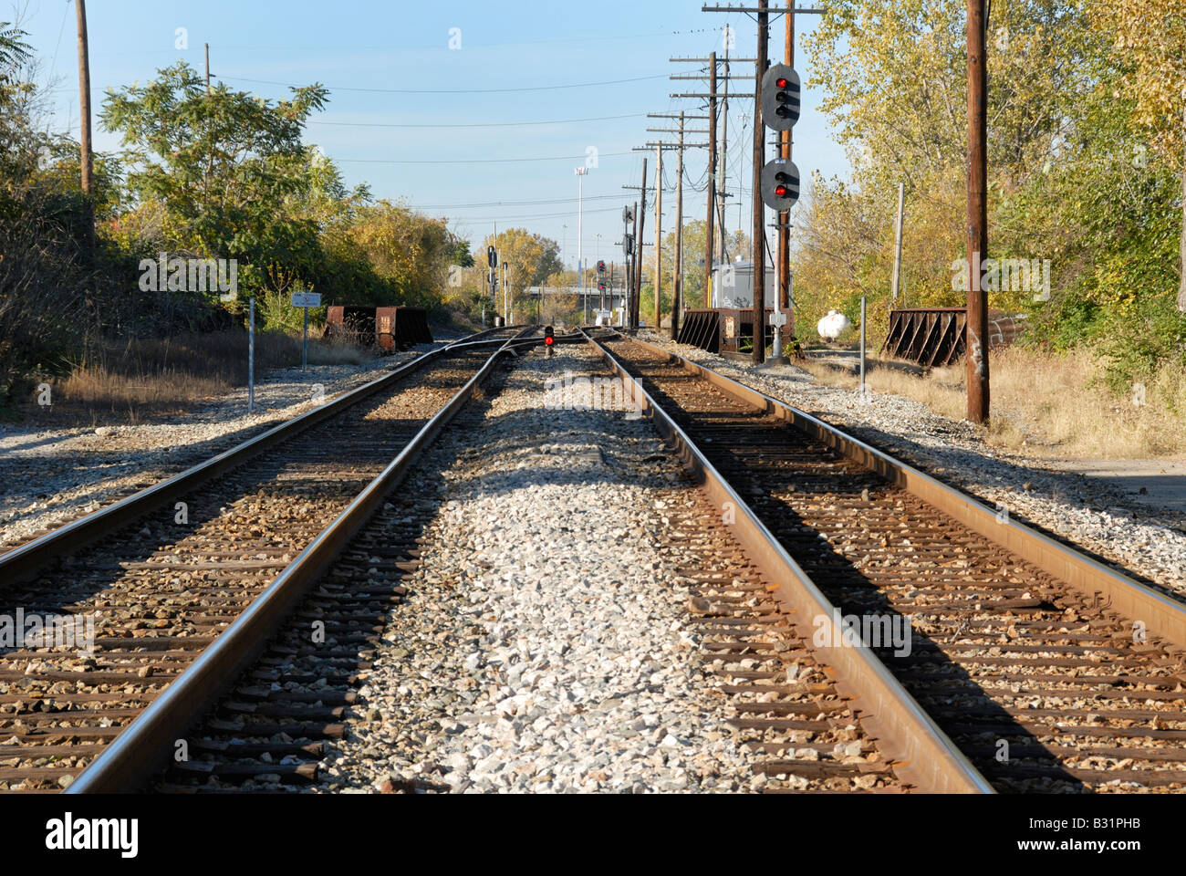 Railroad tracks and signal lights Stock Photo - Alamy