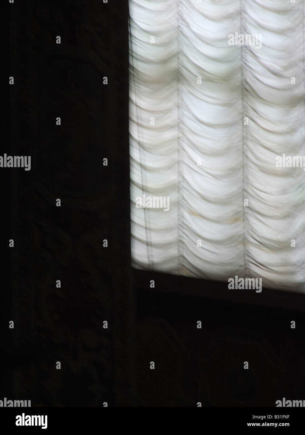 inside window with curtains in dark room Stock Photo - Alamy
