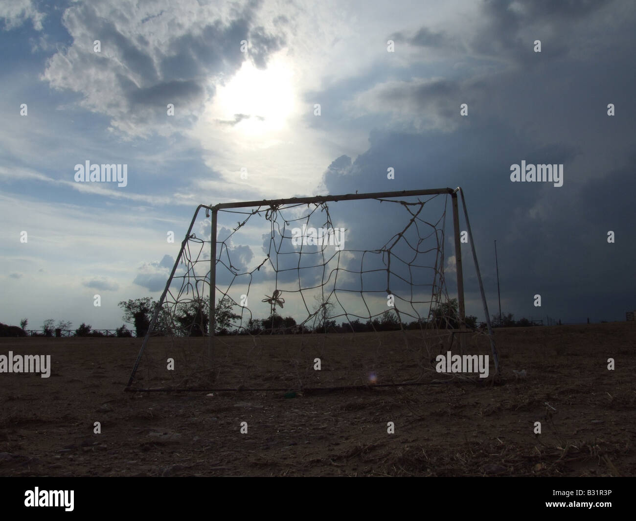 silhouette detail old football goal posts in field Stock Photo - Alamy