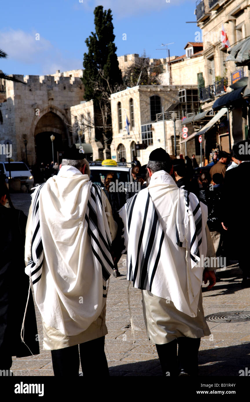 Orthodox Jewish men walk in the old city of Jerusalem near Jaffa gate ...