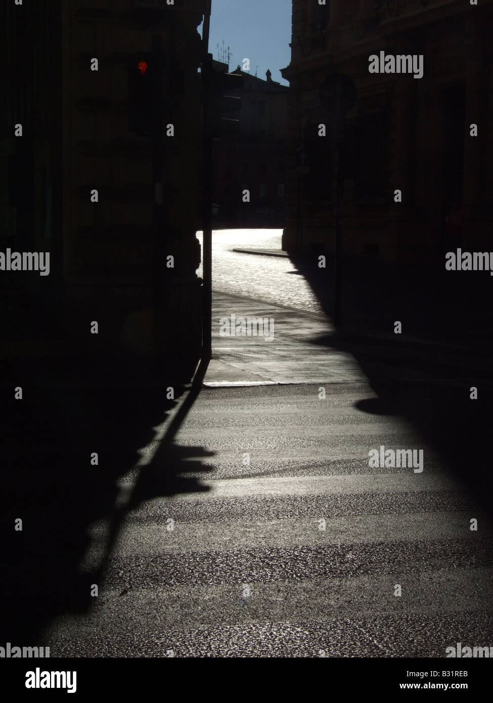 traffic lights dark shadow on road surface in town Stock Photo - Alamy