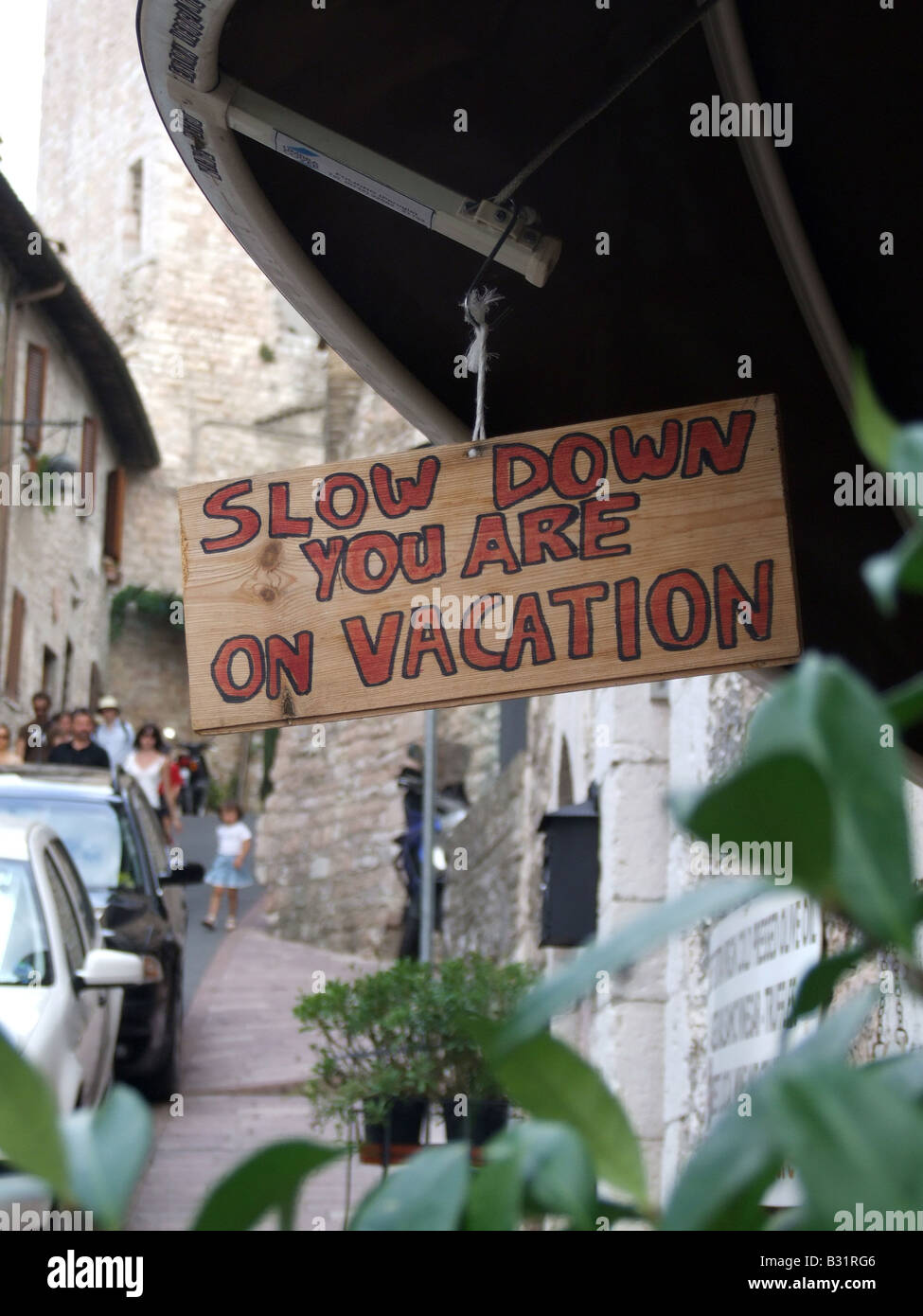 funny sign in street assisi italy Stock Photo - Alamy