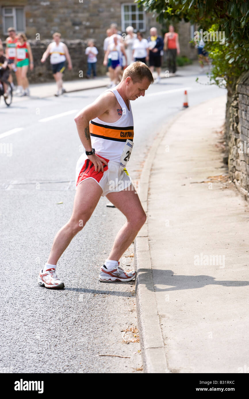 runner warming up before a race Stock Photo - Alamy