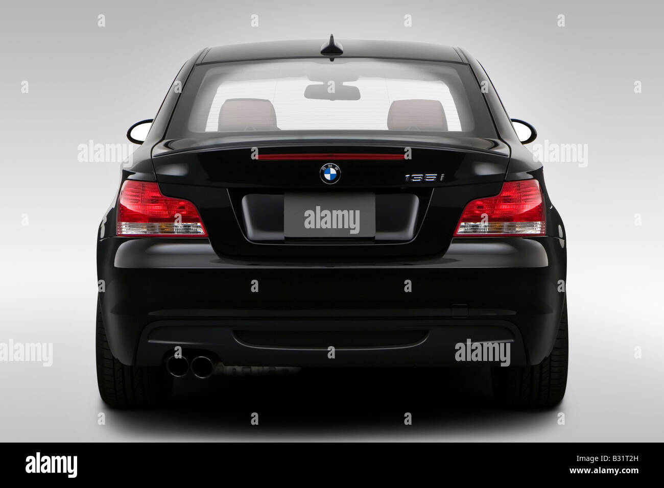 2008 BMW 1-series 135i in Black - Low/Wide Rear Stock Photo - Alamy
