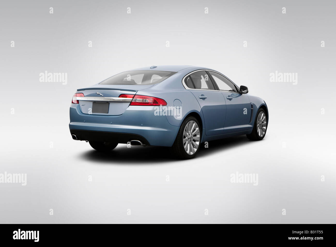 2009 Jaguar XF Luxury in Blue - Rear angle view Stock Photo - Alamy