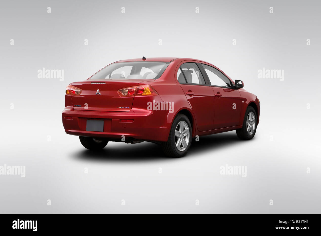 2009 Mitsubishi Lancer ES in Red - Rear angle view Stock Photo - Alamy