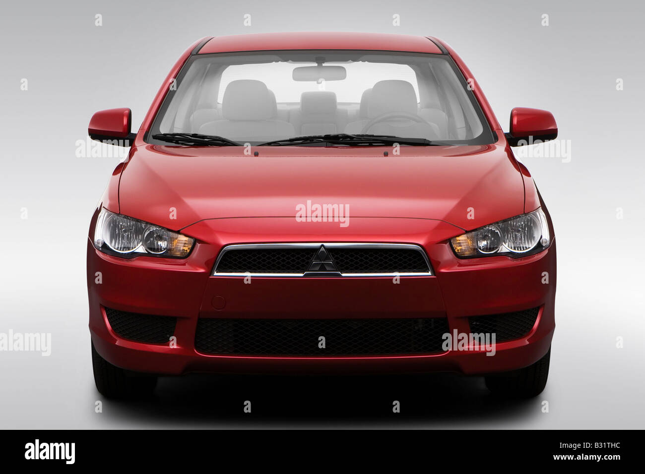 2009 Mitsubishi Lancer ES in Red - Low/Wide Front Stock Photo - Alamy