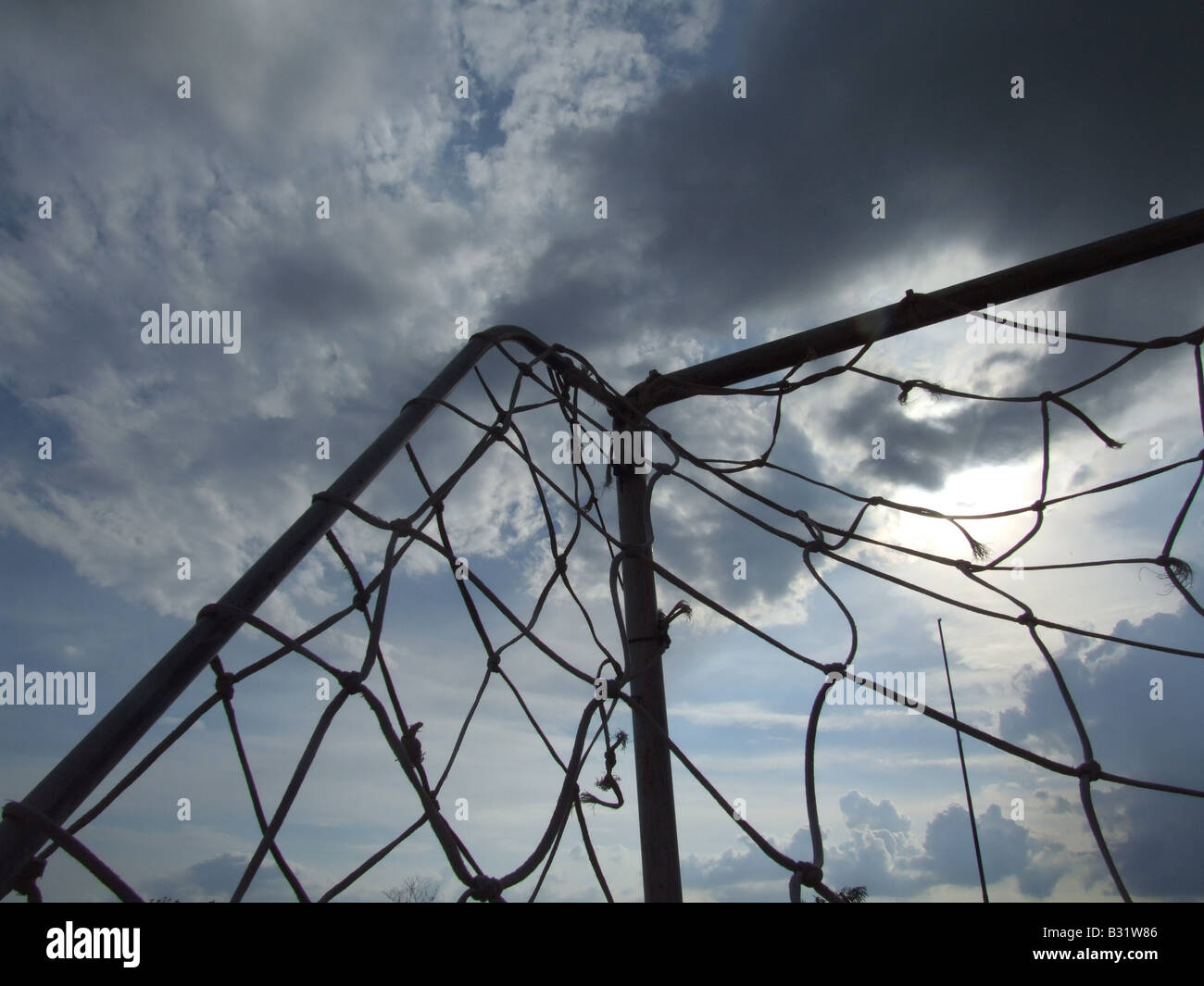 silhouette detail old football goal posts in field Stock Photo - Alamy