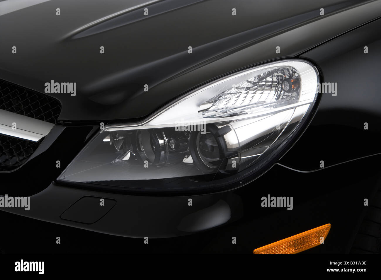 2009 Mercedes-Benz SL-Series SL550 in Black - Headlight Stock Photo - Alamy