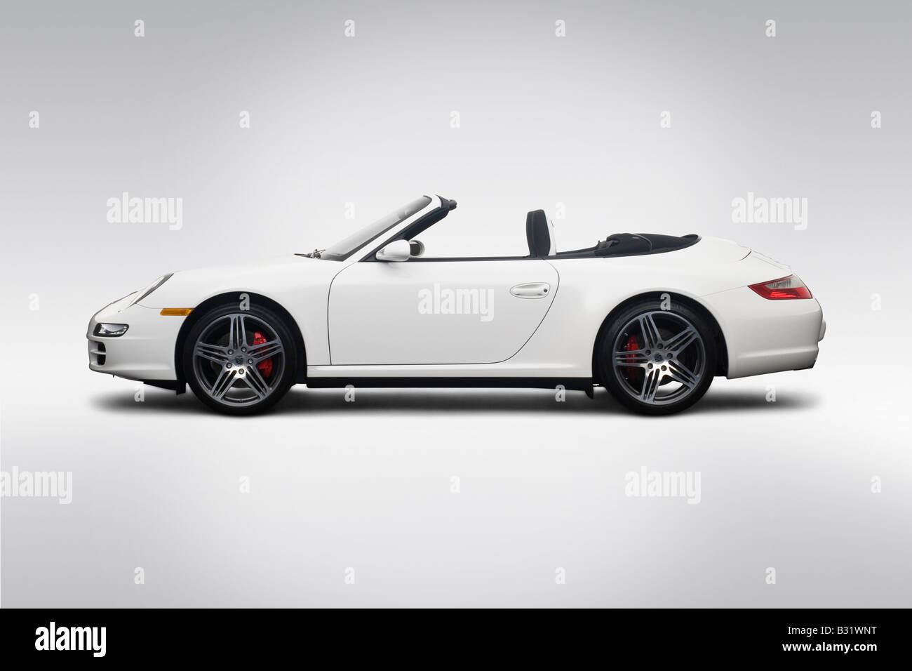 2008 Porsche 911 Carrera 4S in White - Drivers Side Profile Stock Photo ...