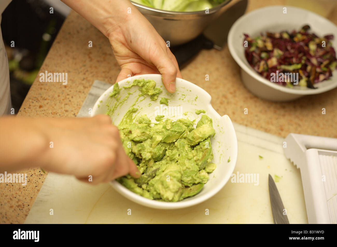 Cooking method making guacamole Stock Photo - Alamy