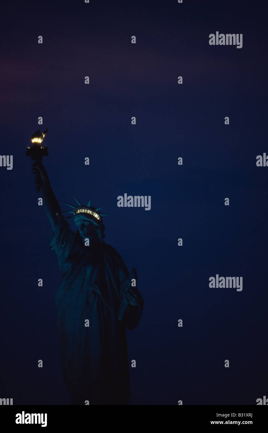 New York Statue of Liberty at night Stock Photo - Alamy