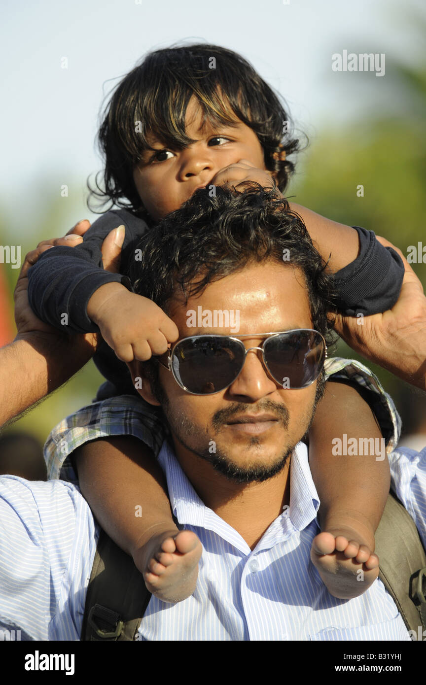 Carry child hi-res stock photography and images - Alamy