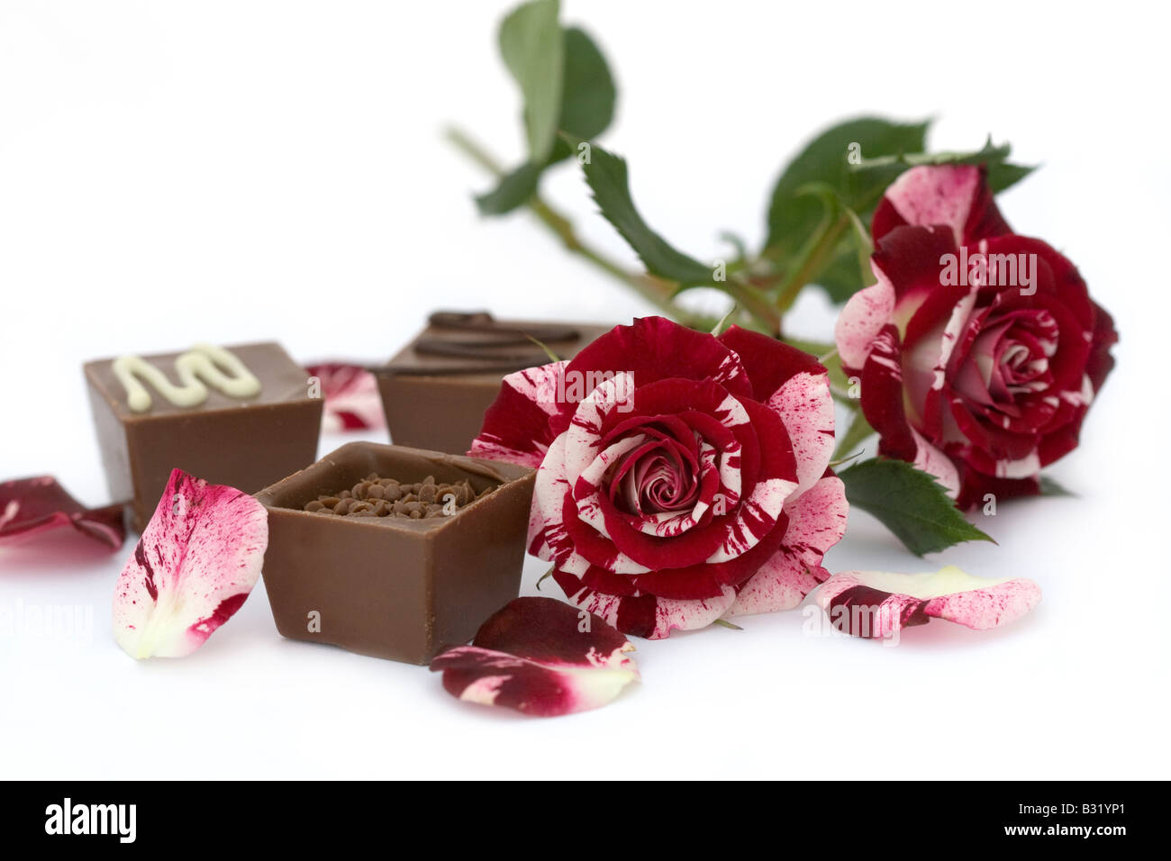 Chocolates and roses Stock Photo - Alamy