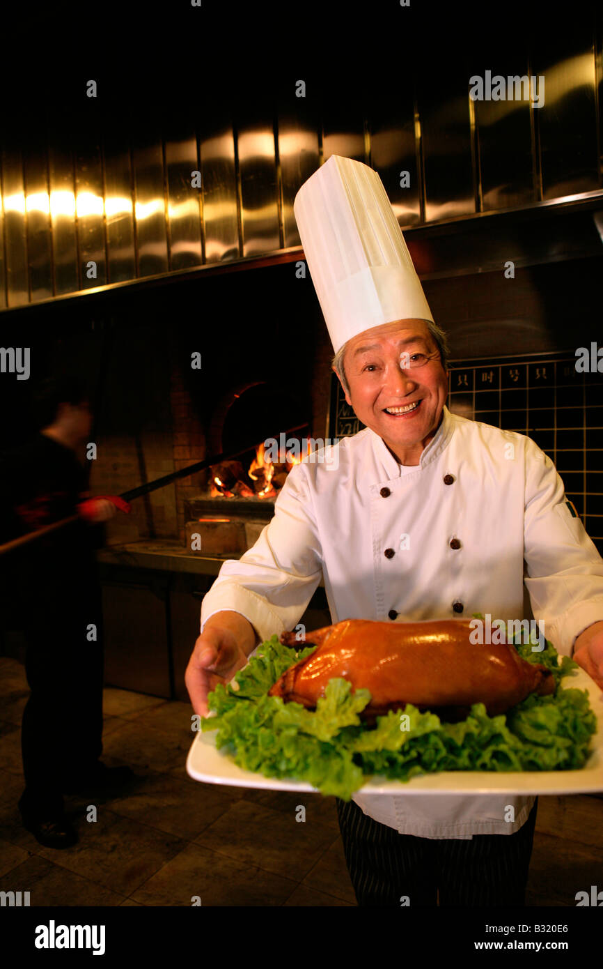 Two chinese cook hi-res stock photography and images - Alamy
