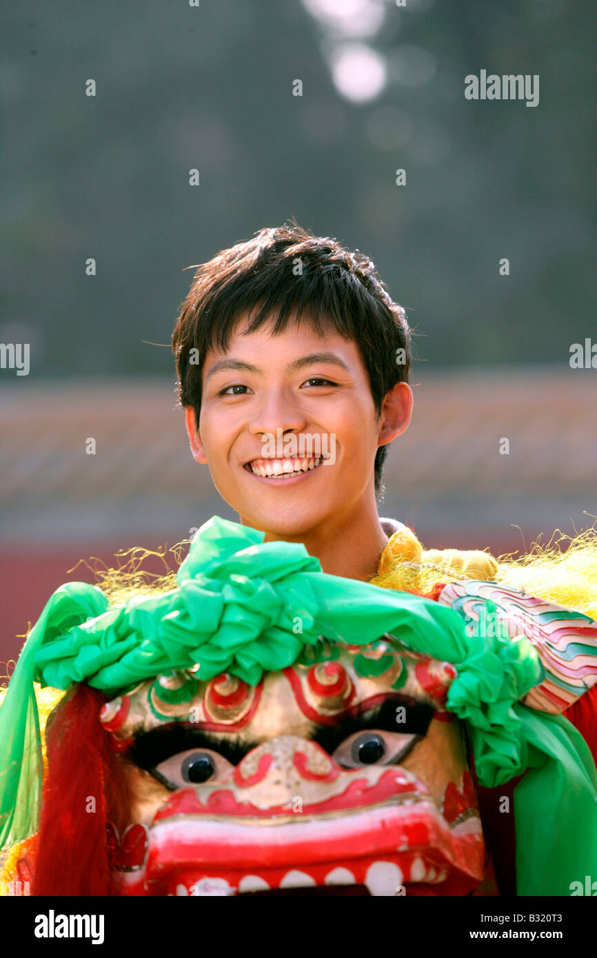 Chinese Young Man,Lion Dancing Stock Photo - Alamy