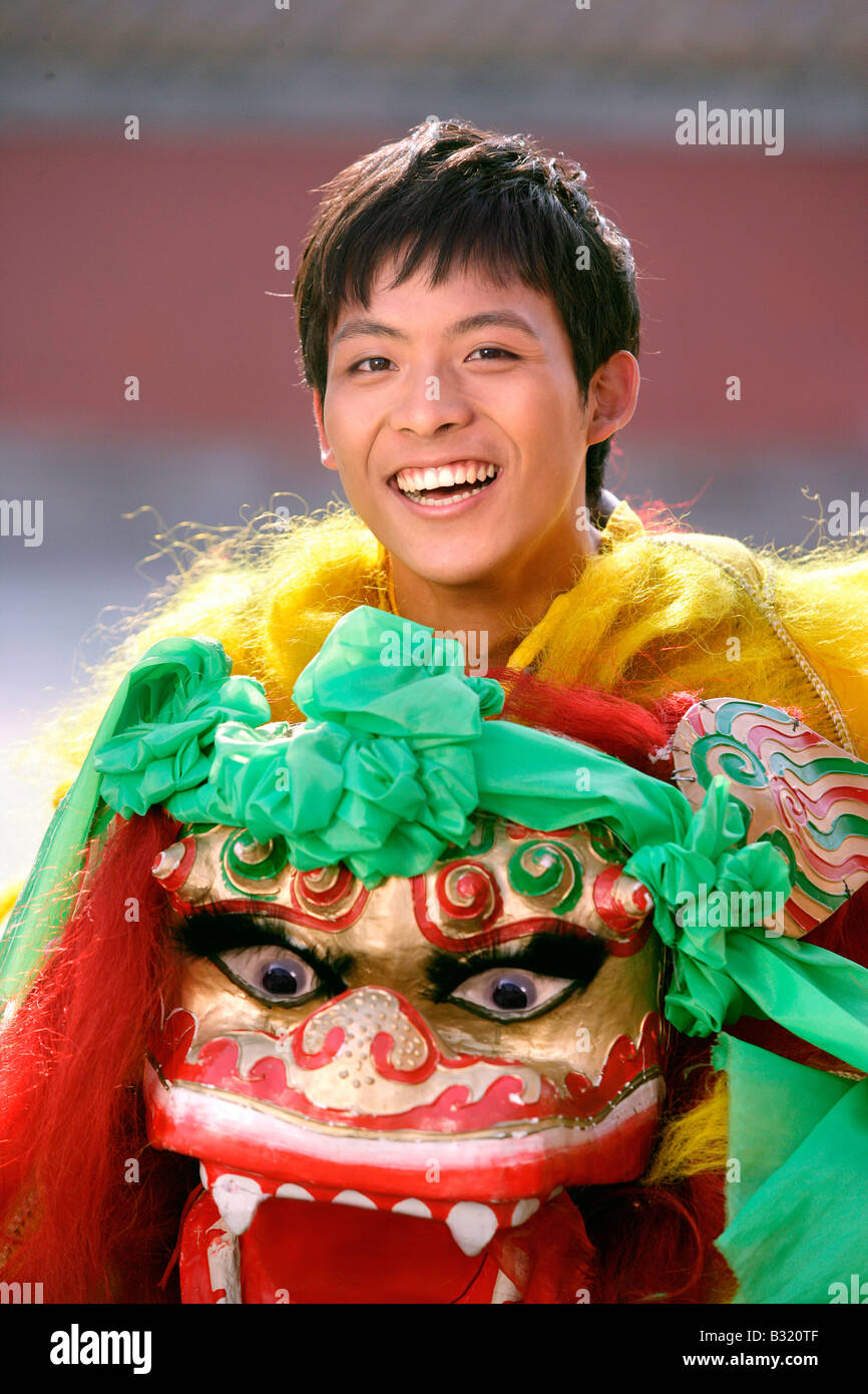 Chinese Young Man,Lion Dancing Stock Photo - Alamy