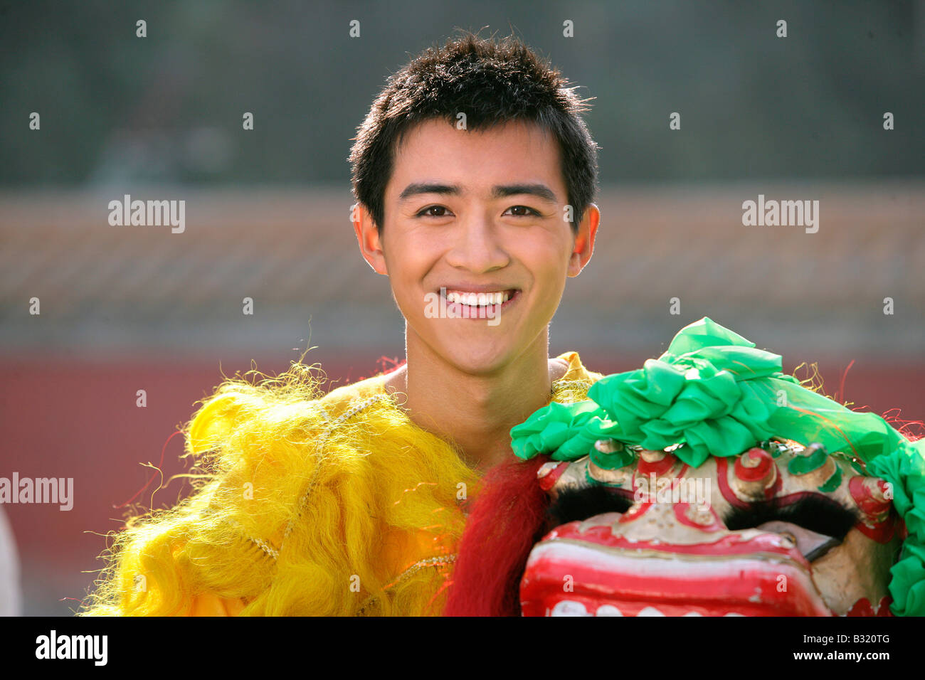 Chinese Young Man,Lion Dancing Stock Photo - Alamy