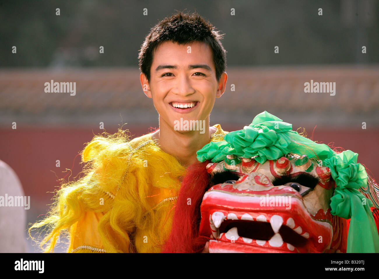 Chinese Young Man,Lion Dancing Stock Photo - Alamy