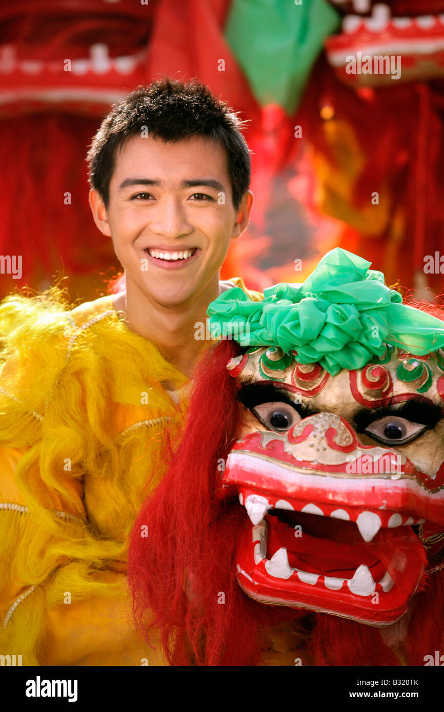 Chinese Young Man,Lion Dancing Stock Photo - Alamy