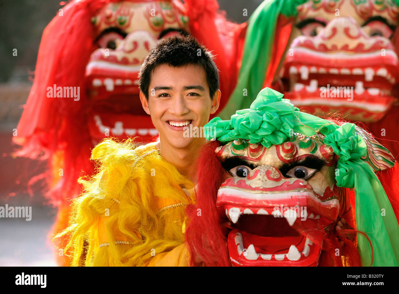 Chinese Young Man,Lion Dancing Stock Photo - Alamy