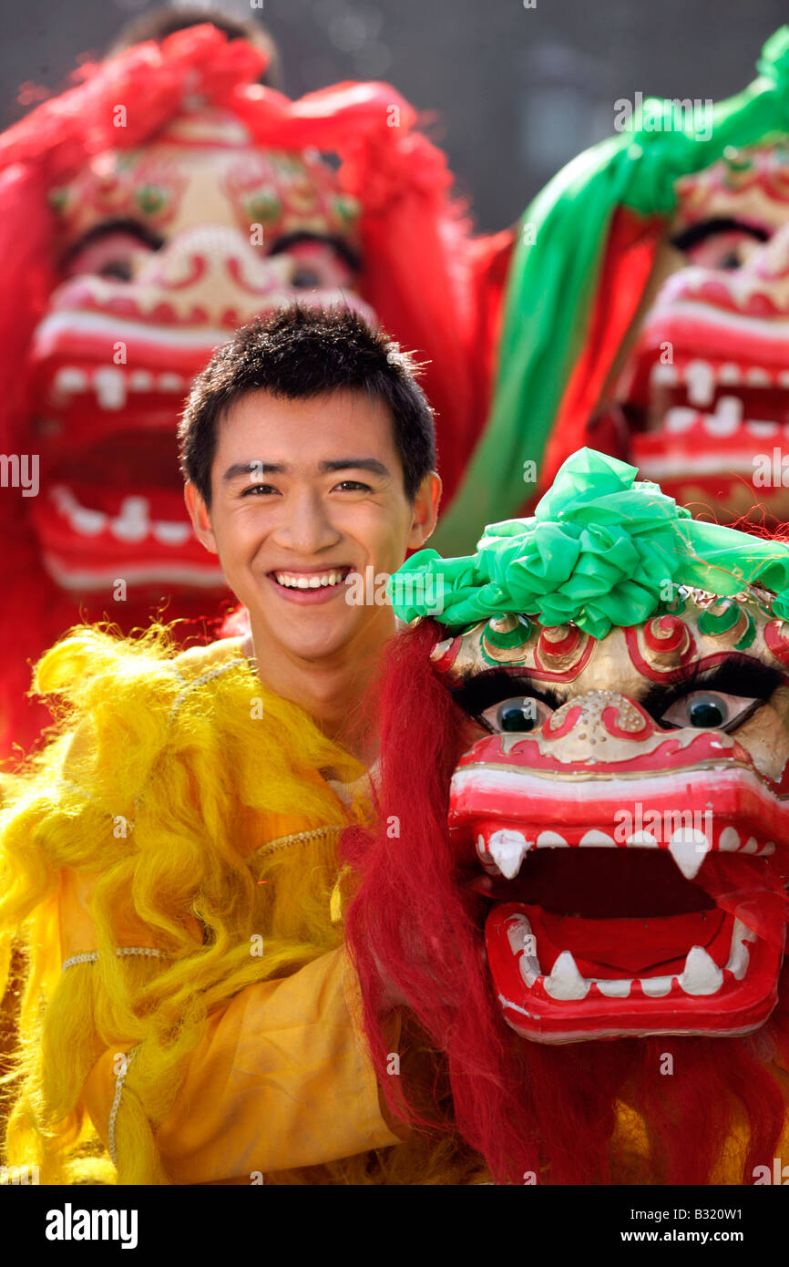 Chinese Young Man,Lion Dancing Stock Photo - Alamy