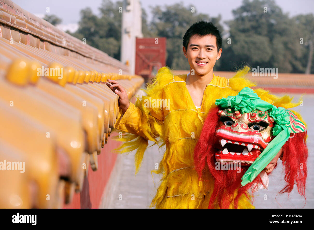 Chinese Young Man,Lion Dancing Stock Photo - Alamy