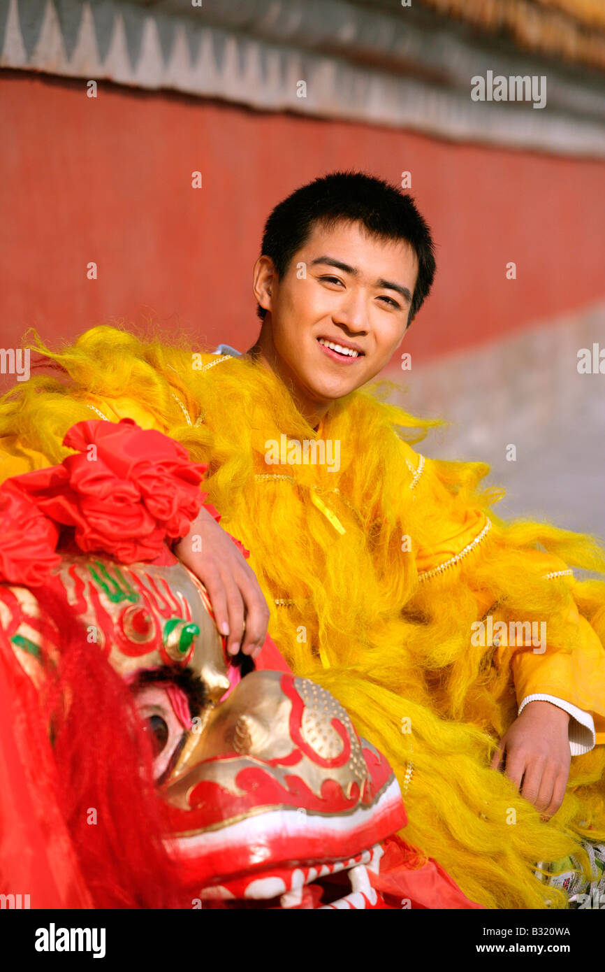 Chinese Young Man,Lion Dancing Stock Photo - Alamy
