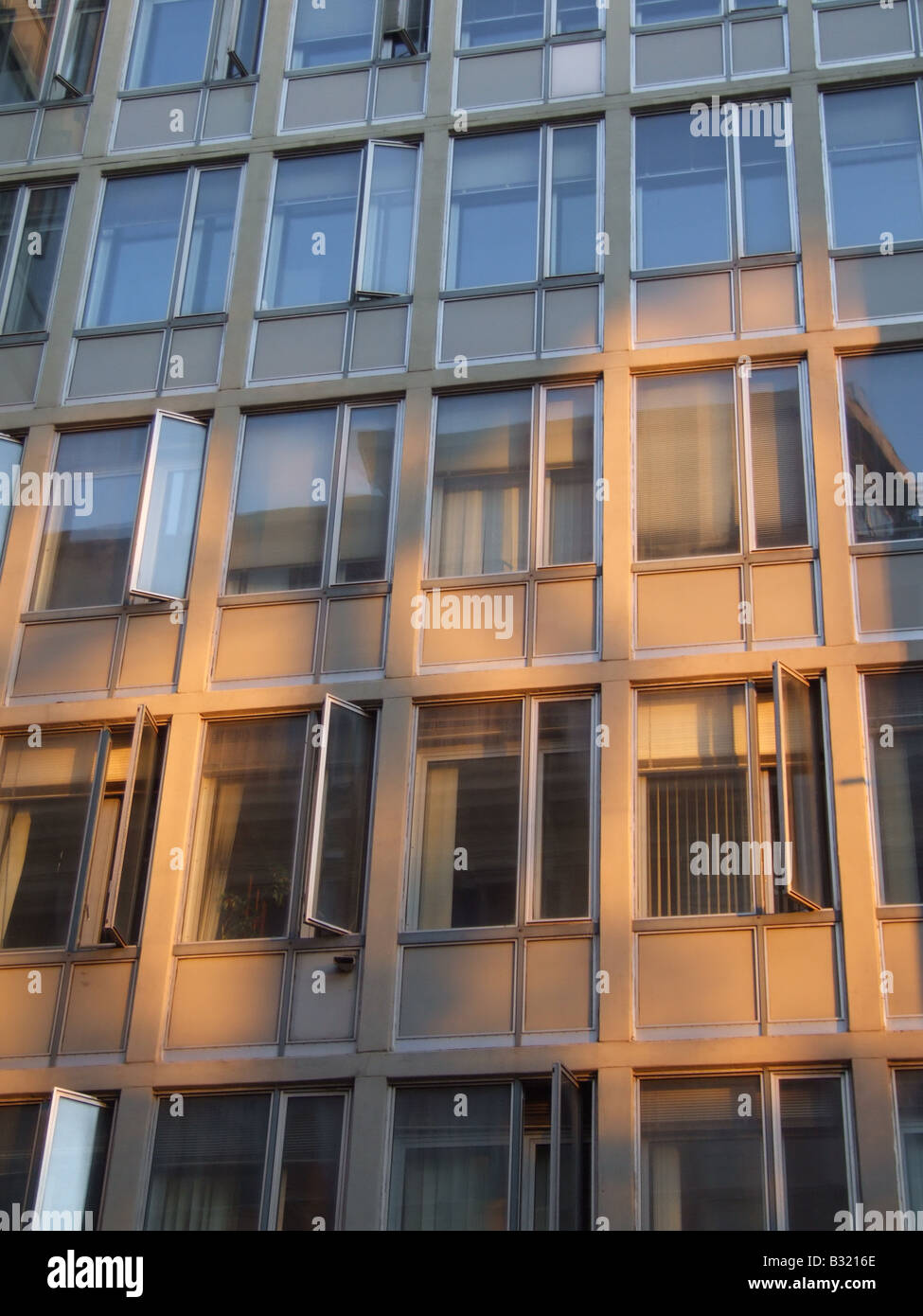detail of office block facade windows in sun light Stock Photo - Alamy