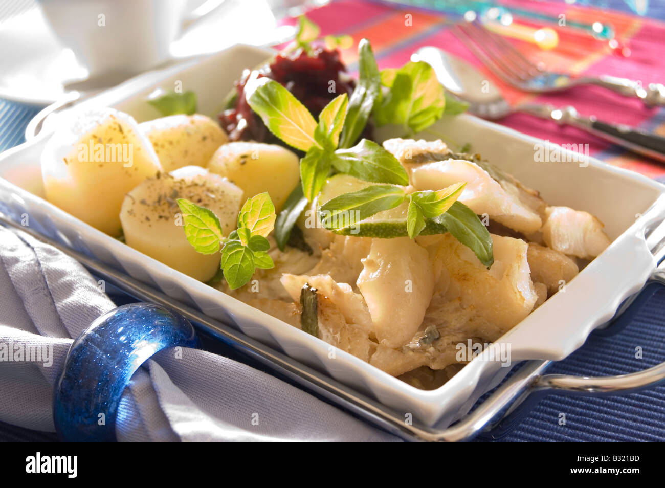 Cooked halibut fish served with potatoes Stock Photo - Alamy