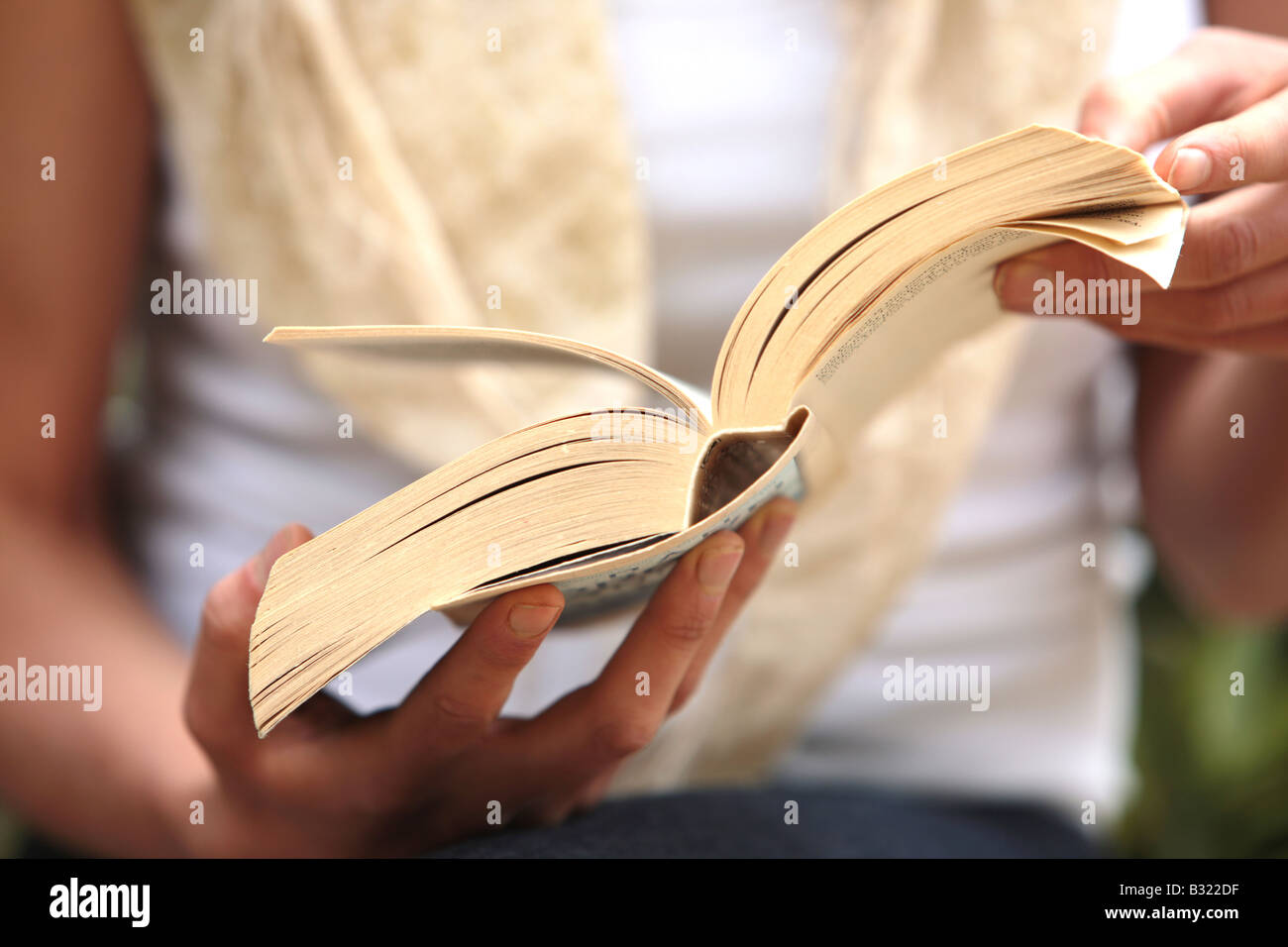 Young Woman Reading a Book Model Released Stock Photo - Alamy